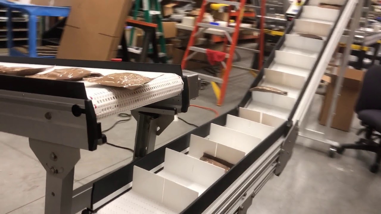 Z X Elevator Conveyor With Infeed by SmartMove® - YouTube
