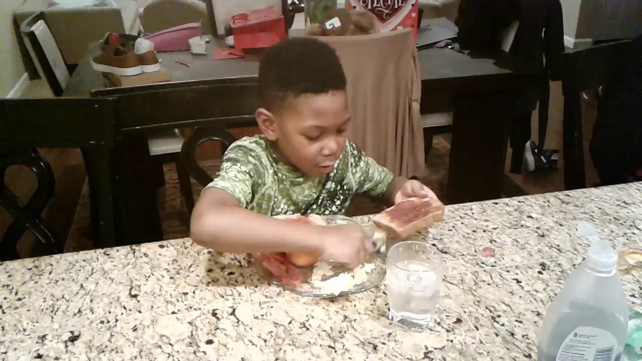 Austin cooks dinner. Aiden the food critic. - YouTube