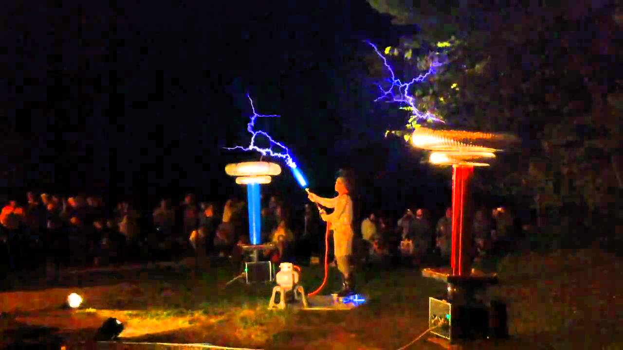 fun with a tesla coil and a propane torch - YouTube