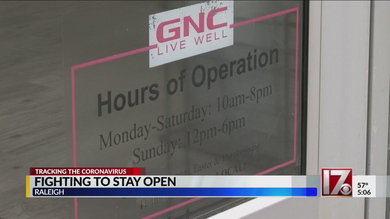 GNC owner complains of non-essential status - YouTube