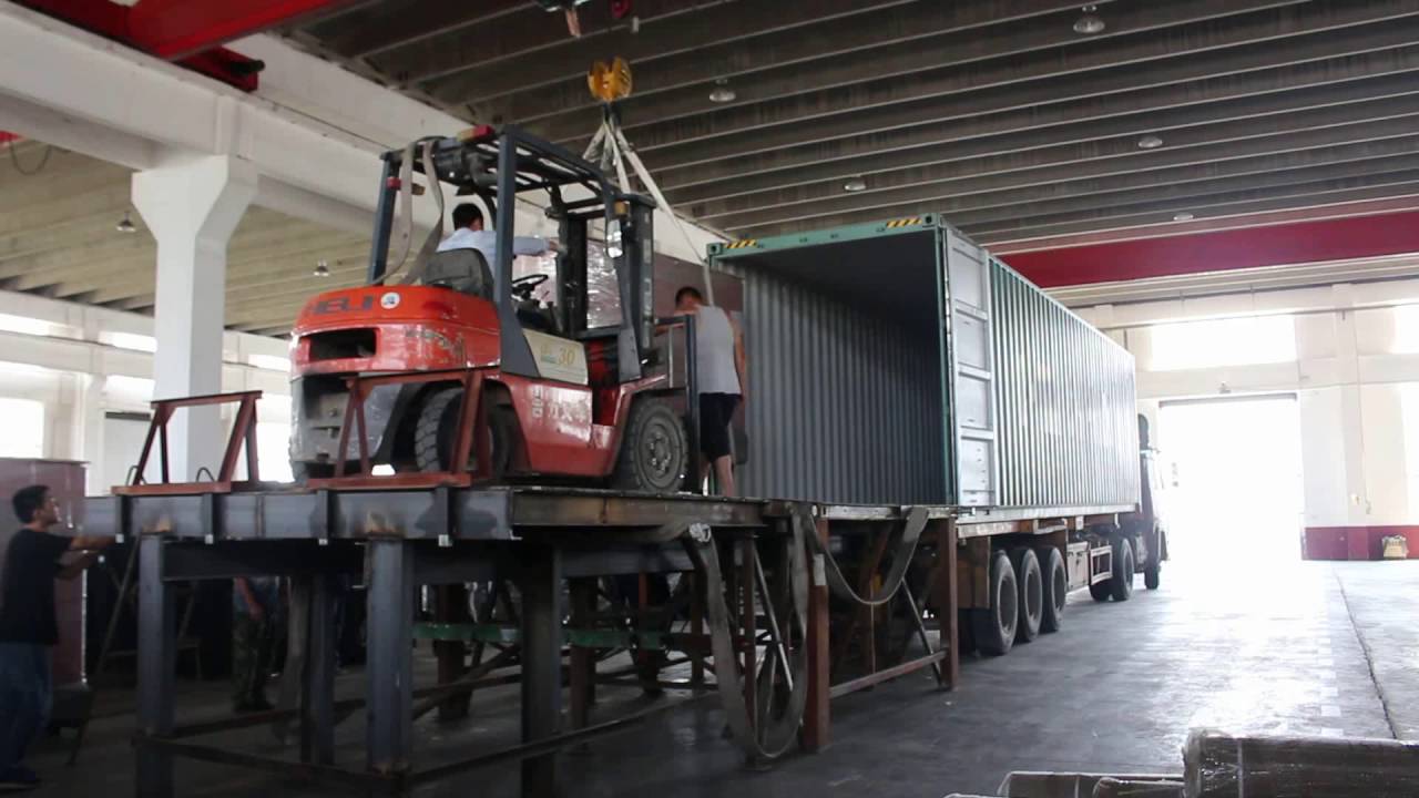 Loading the container with a steel platform - YouTube