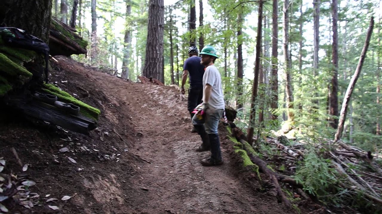 berm work on the flow trail - YouTube