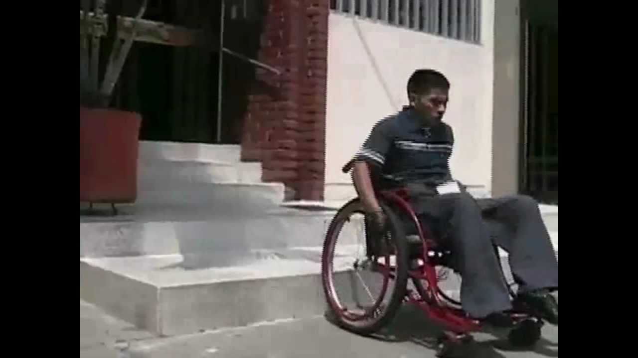 Whirlwind Wheelchair International and the RoughRider Wheelchair - YouTube