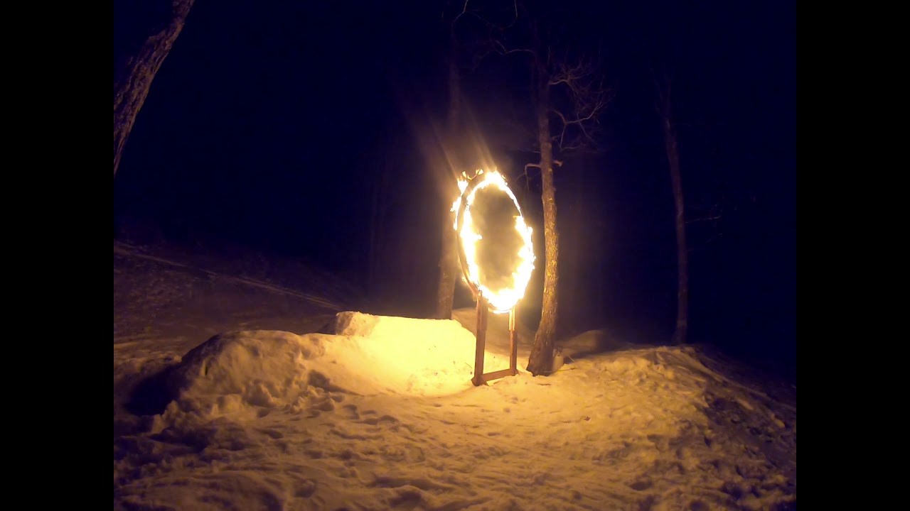 Snowboarding through a ring of fire - YouTube