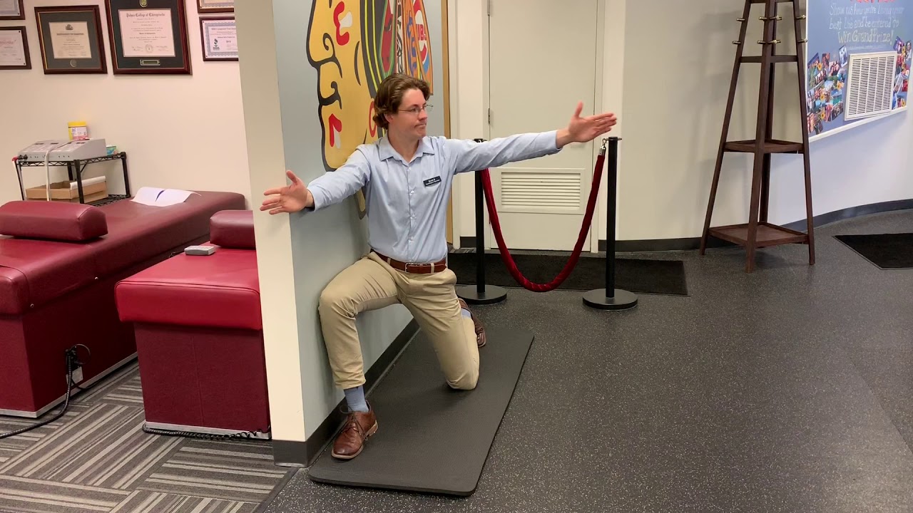 Kneeling Thoracic Rotations with Wall - YouTube