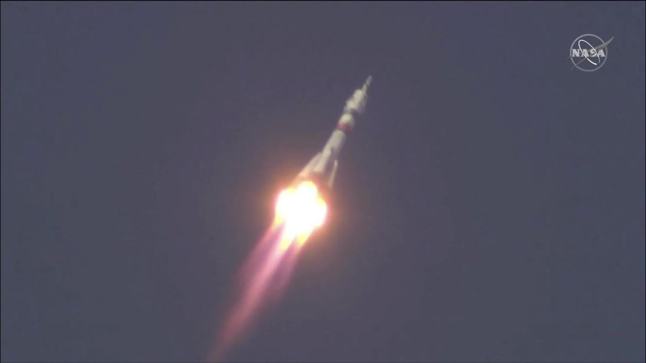 Blastoff! New Space Station crew launches atop Soyuz rocket - YouTube