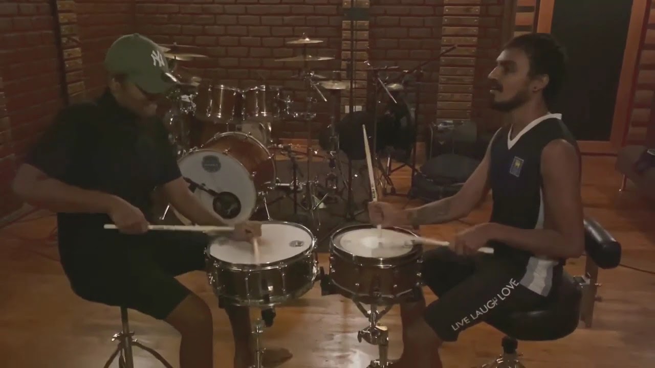 Trying out some paradiddle variations with this master Jimith - YouTube