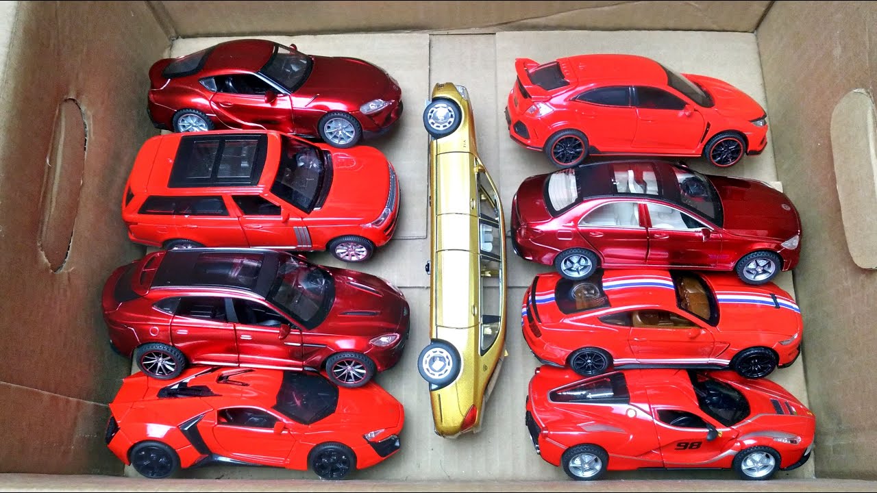 Box full of various miniature cars Peugeot, Volvo, Renault, Hyundai ...