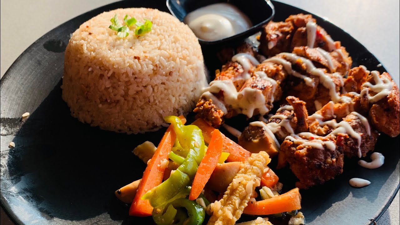 Gyro chicken over ricechoice of rice served with gyro chicken topped ...