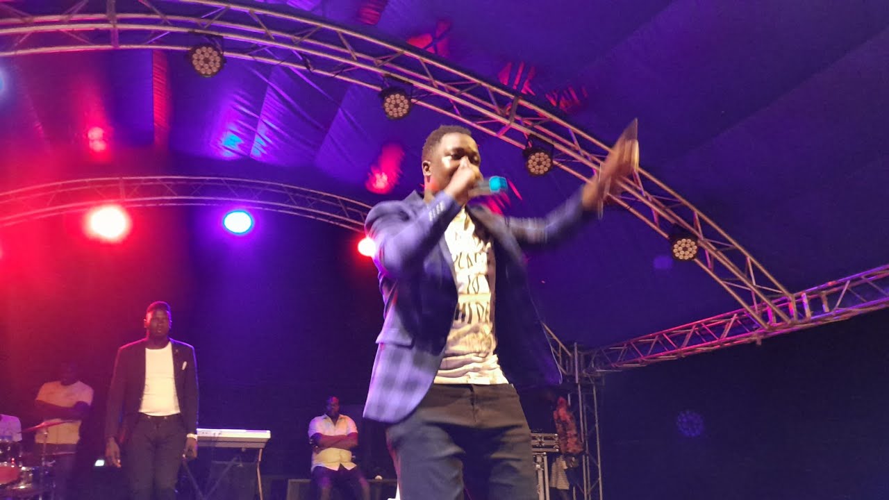 Naffz Cee Performing live at Amoding Faith's 20 years in concert - YouTube