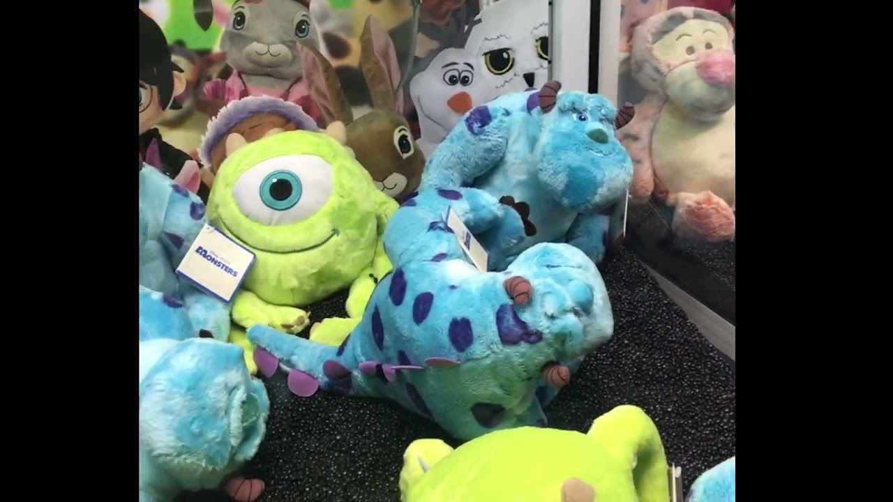 Epic win @ cosmic XL claw machine with giant dinosaur and some more 7 ...