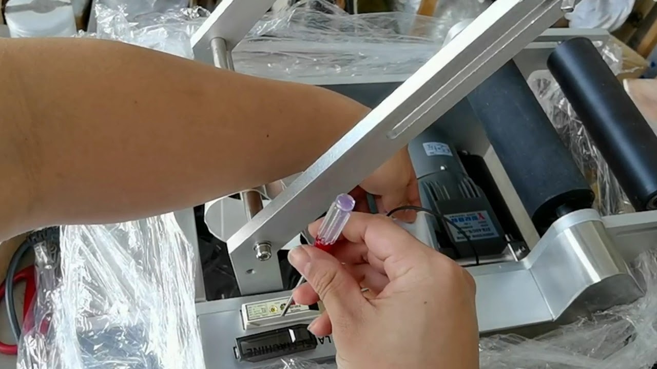 how to adjust labels sensor for round bottles labeling machine with ...