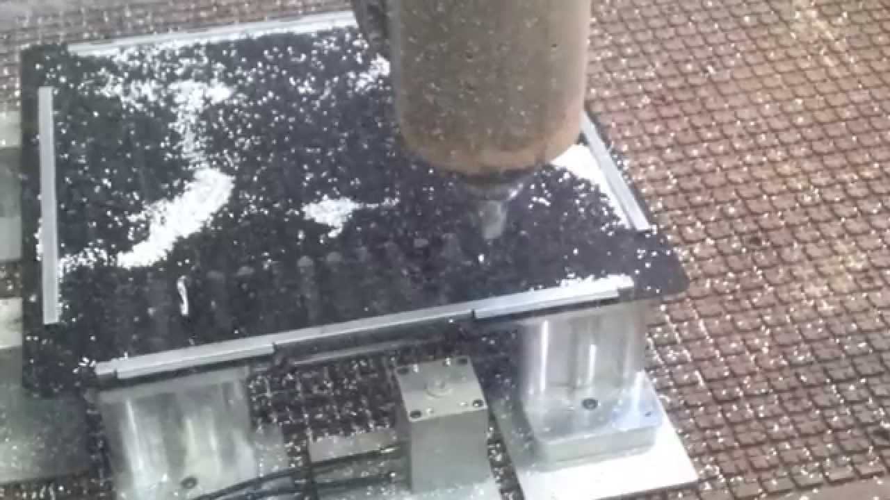 Cutting fan holes in Lian Li PC-V2010B - YouTube