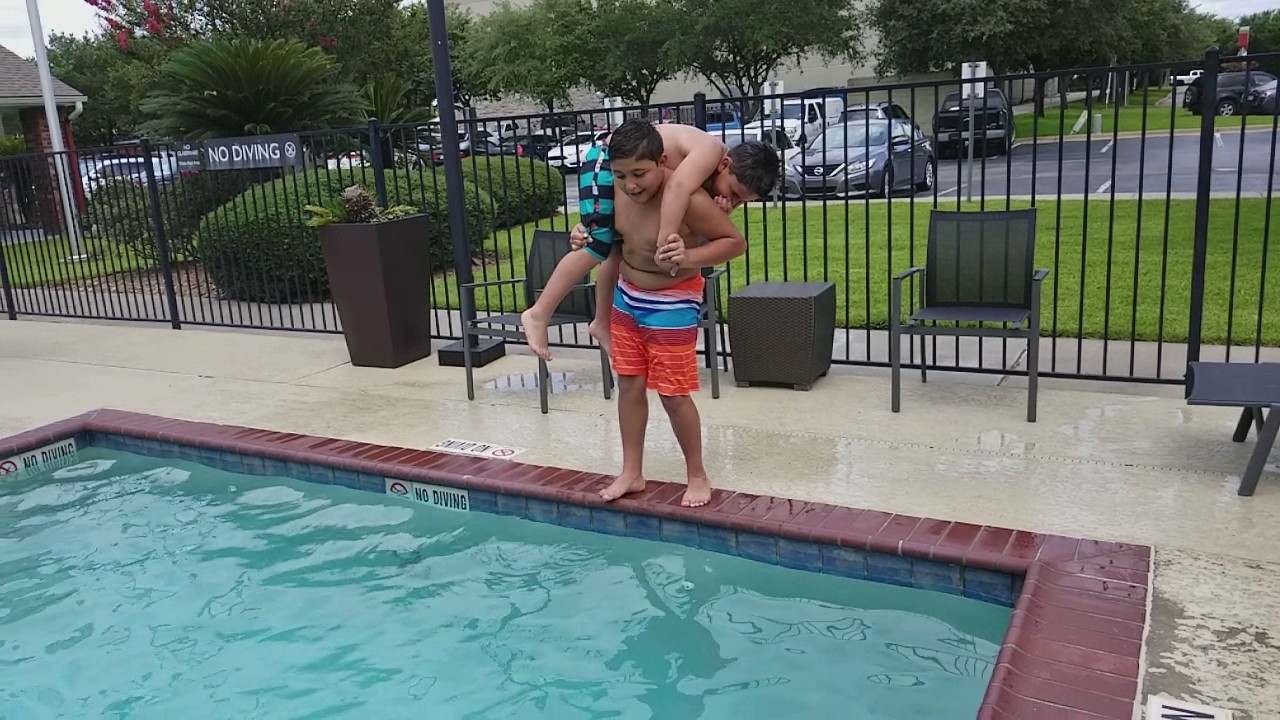 JC body slamming Aaron in the pool. - YouTube
