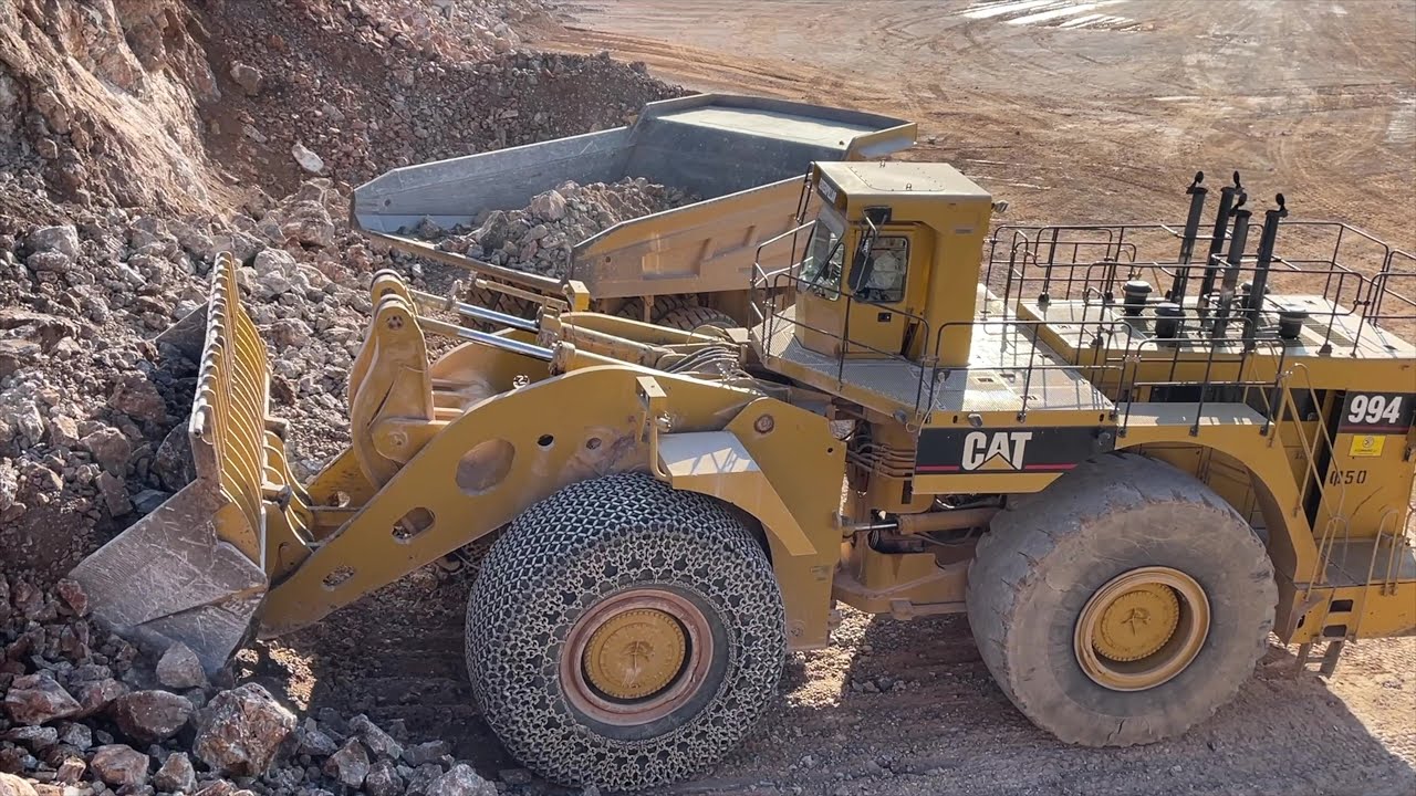 Huge Caterpillar 994/ 230 Tons Wheel Loader Loading Caterpillar 777F ...