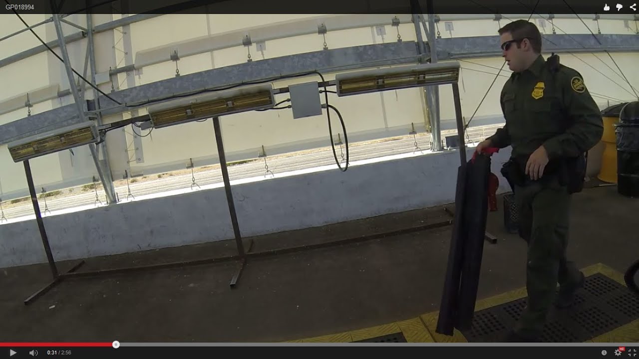 DHS Agent removes Spike Strip blocking Gibson Citizen's tire - US ...