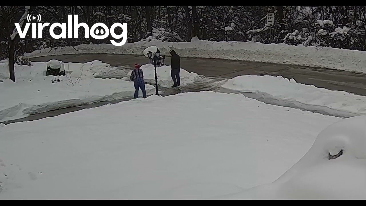 Man Slides Down Icy Driveway and Falls || ViralHog - YouTube