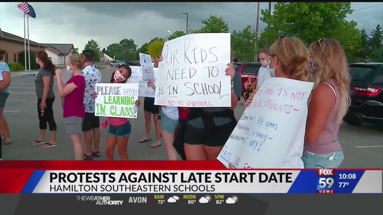 Parents protest delayed return to school - YouTube