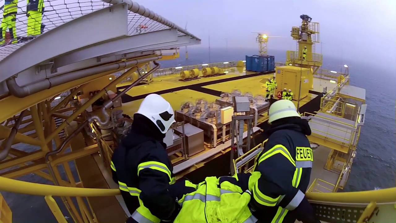 Helicopter evacuation at offshore wind farm Butendiek - YouTube
