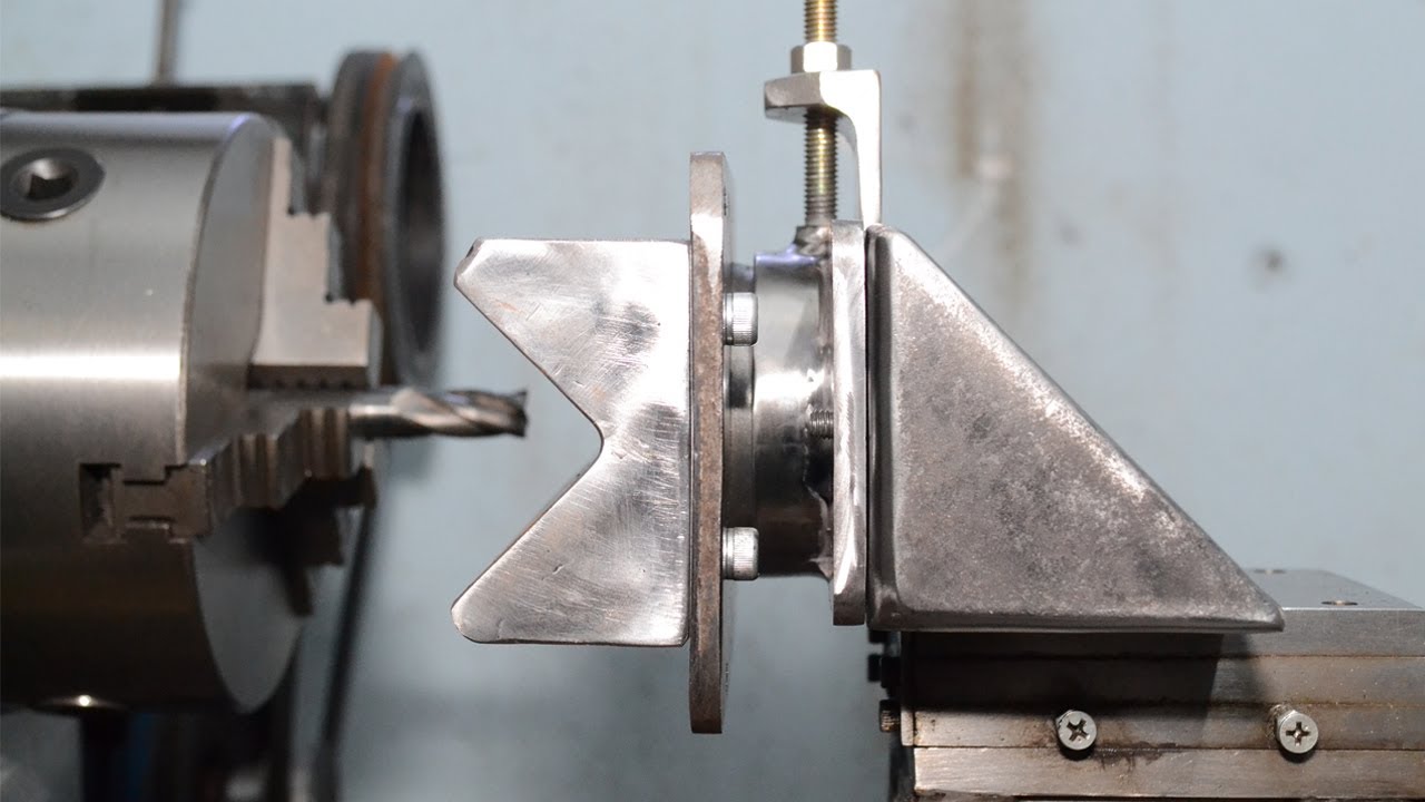 A special tool to hold the workpiece to make keyway grooves on the ...