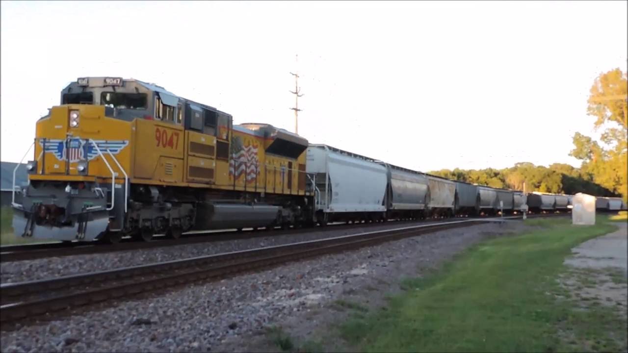 UP engine 8920 a SD70AH leads a grain train with UP 9047 as a DPU - YouTube