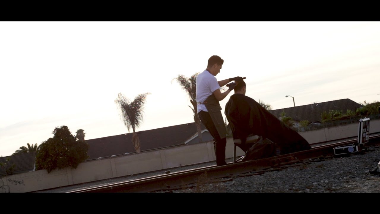 Hair cut the MIDDLE of the TRAIN TRACKS - YouTube