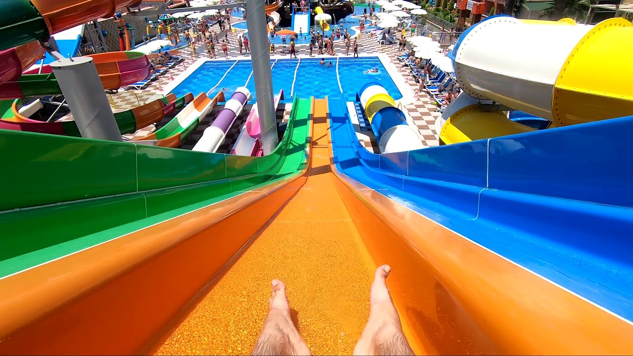 man having fun on a water slide cool people having fun on the water ...
