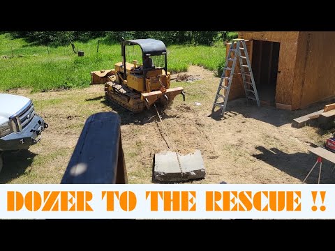 Dozer to the rescue !! Cutting a basement door. - YouTube