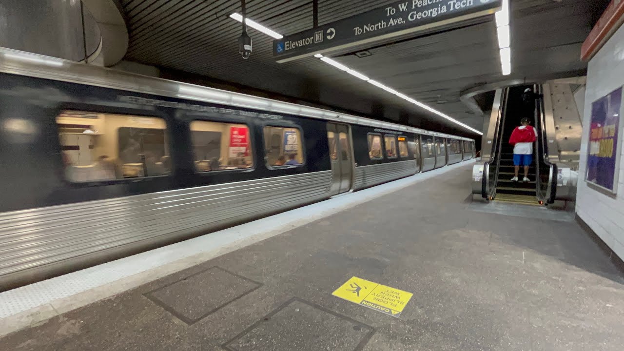 MARTA Gold Line CQ311s Departing North Avenue station - YouTube