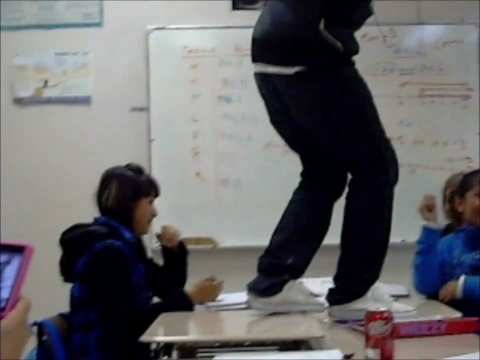 Funny kid messes around in class - YouTube