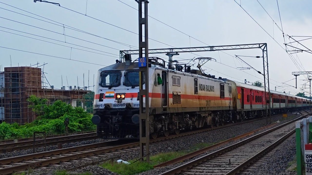 Ahmedabad Howrah SF chasing Freight at full speed after departing from KGP#Railfanning ...
