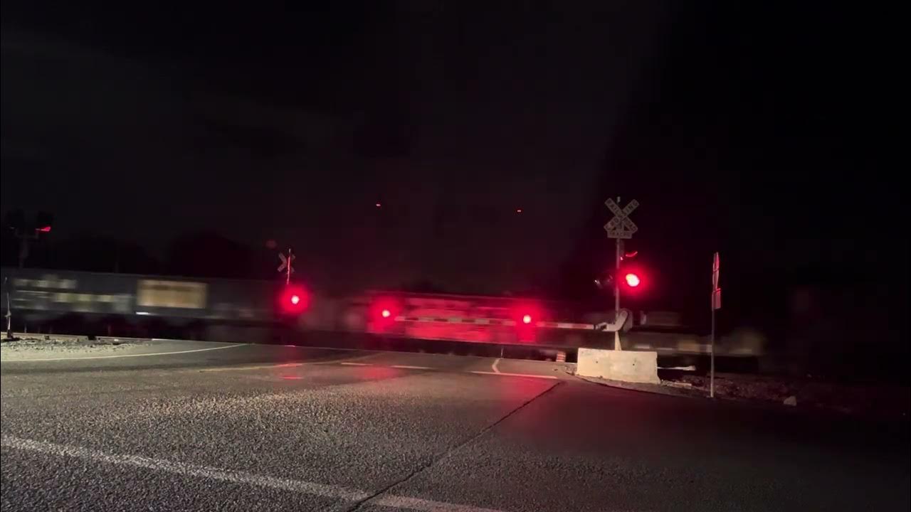 UP 9902 Manifest train east-County road 105 railroad crossing, Davis California - YouTube