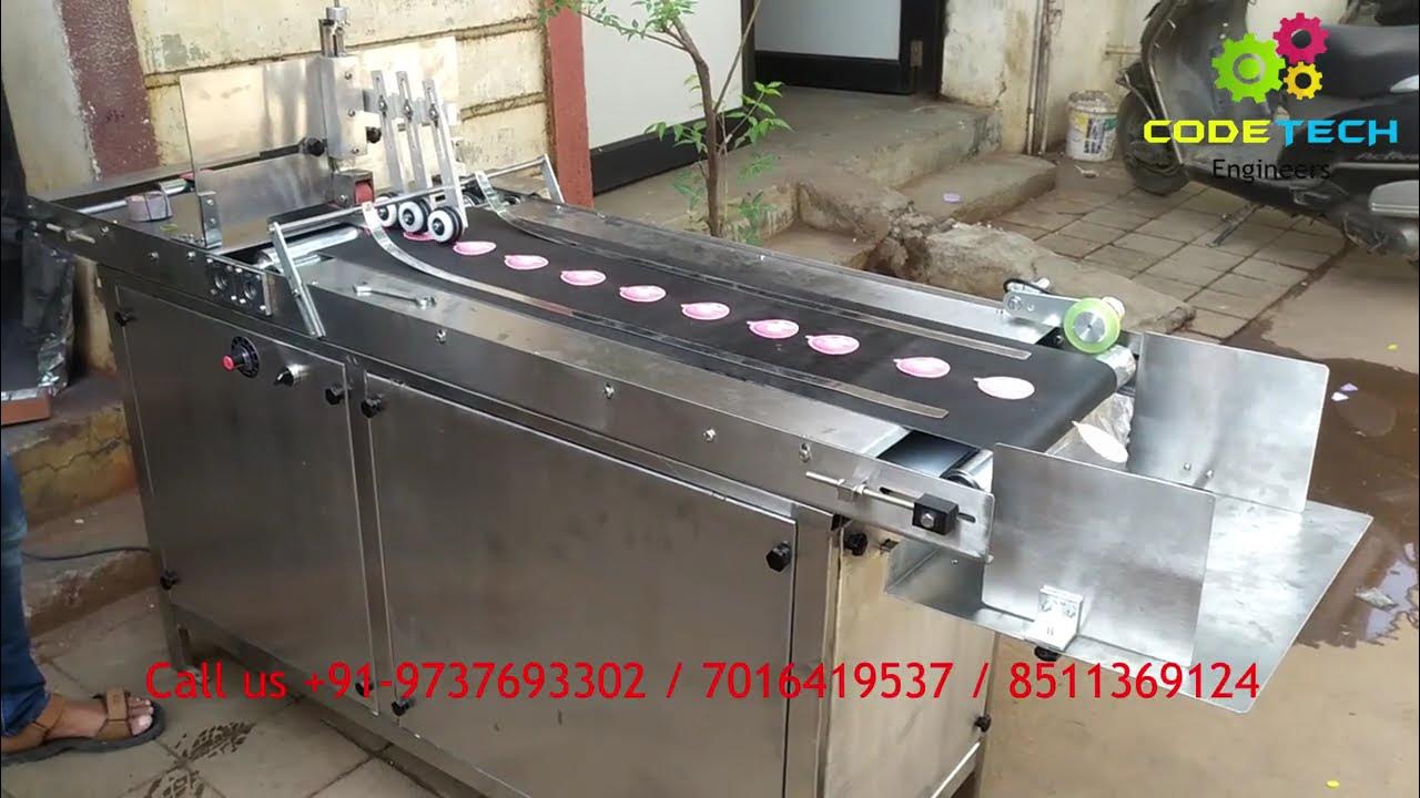 Automatic ice cream lid feeding machine || Ice Cream Industry Coding Machine - YouTube