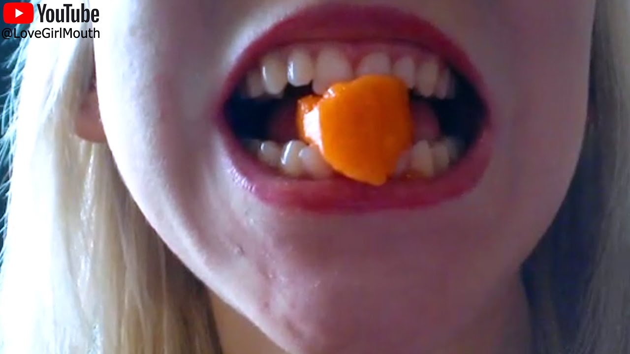 Blonde Girl with wonderful teeth chewing and biting carrot uvula girl ...