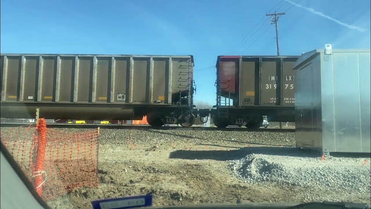 BNSF 9032 leads an Empty Coal Train + TEXRail at Tower 60 - YouTube