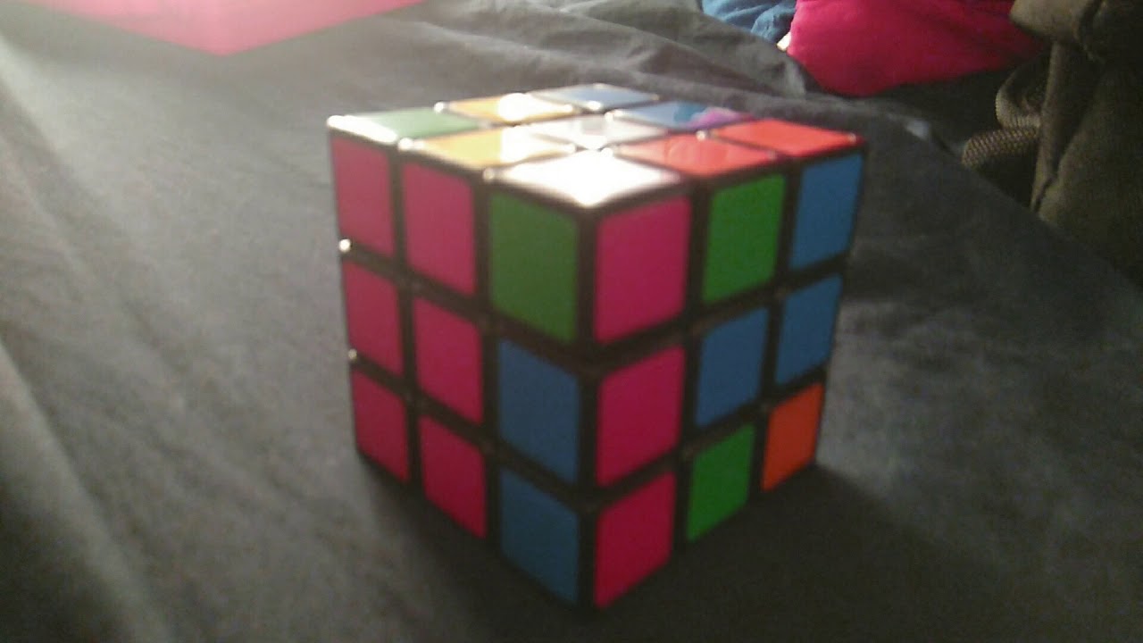 "My first stop Motion movie" My rubix cube can solve its self. - YouTube