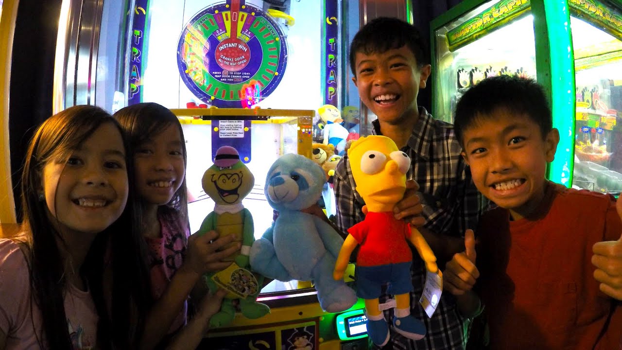 Arcade Prize Game Trapdoor With Kids Working Together To Score Multiple ...