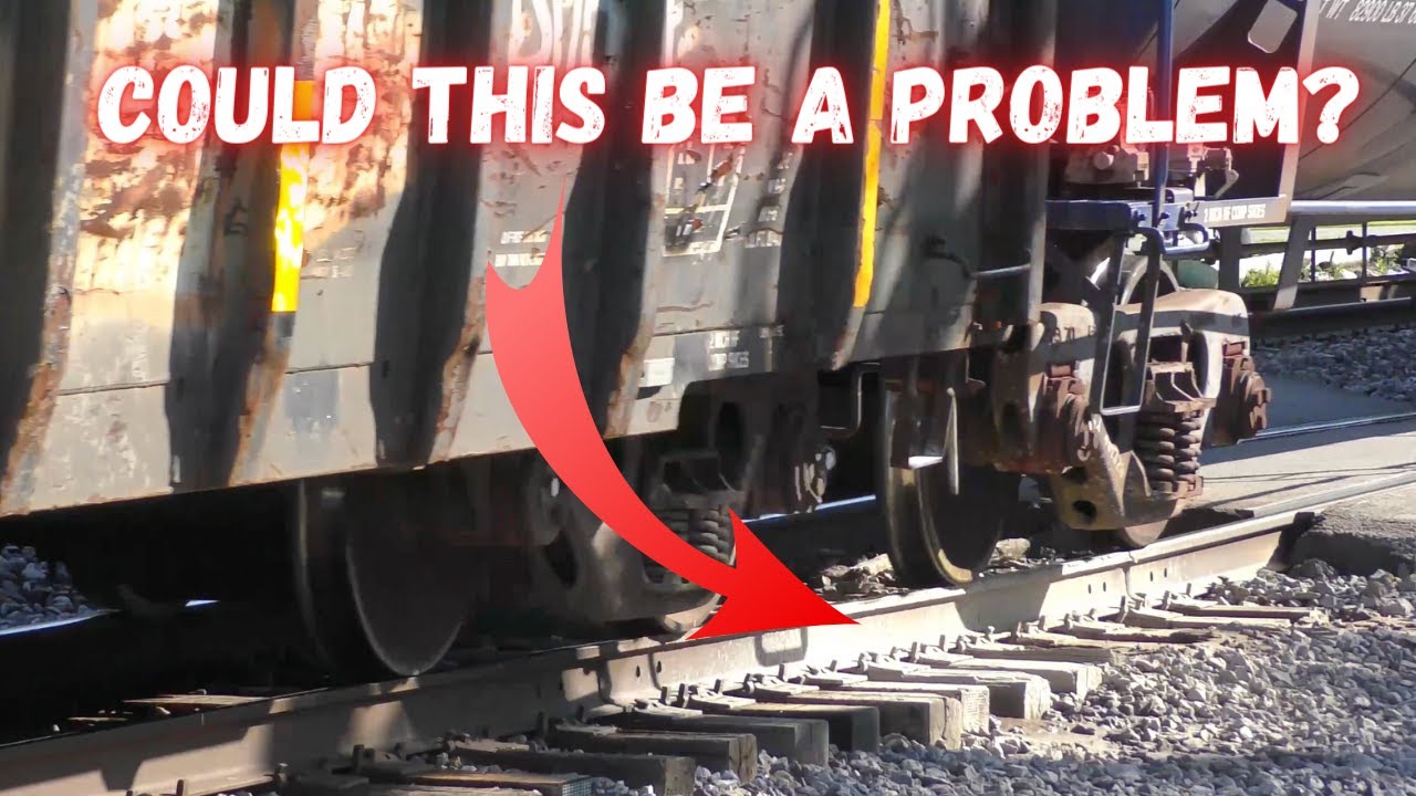 Heavy 2 mile long train runs over washed out section of track. Loud ...