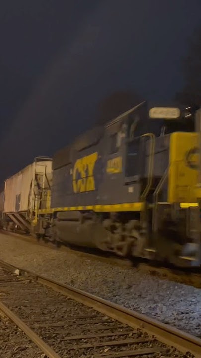CSX 68 CW44AC leads CSX M410 with CSX 4423 GP40-2 trailing at Piscataway - YouTube