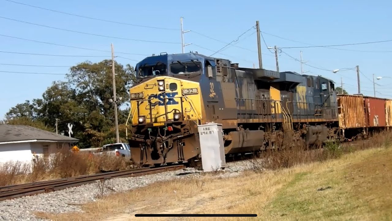 CSX 32 leading W09617 through downtown cordele diamond 10/18/22. - YouTube