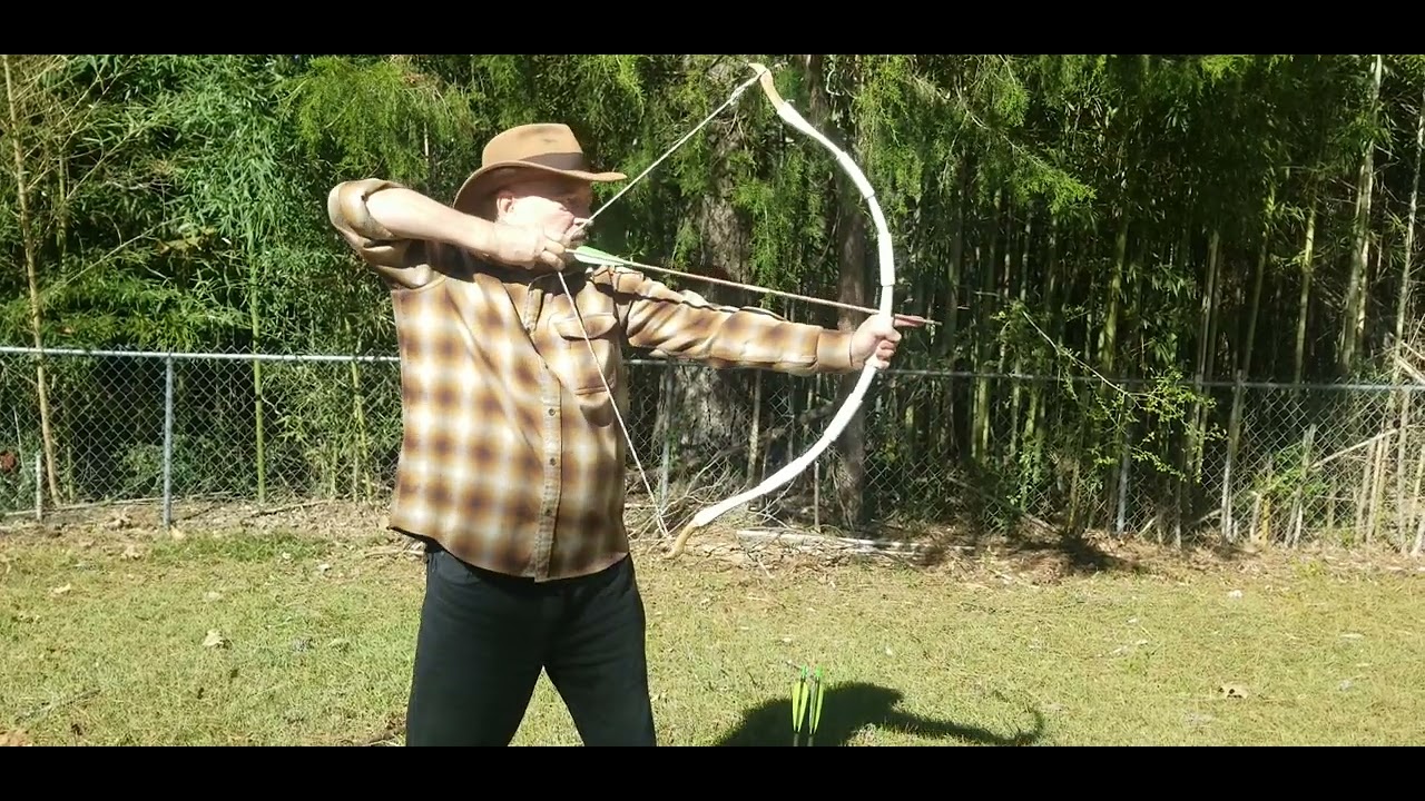 Shooting my 40lb 5 piece take down PVC survival bush bow. - YouTube