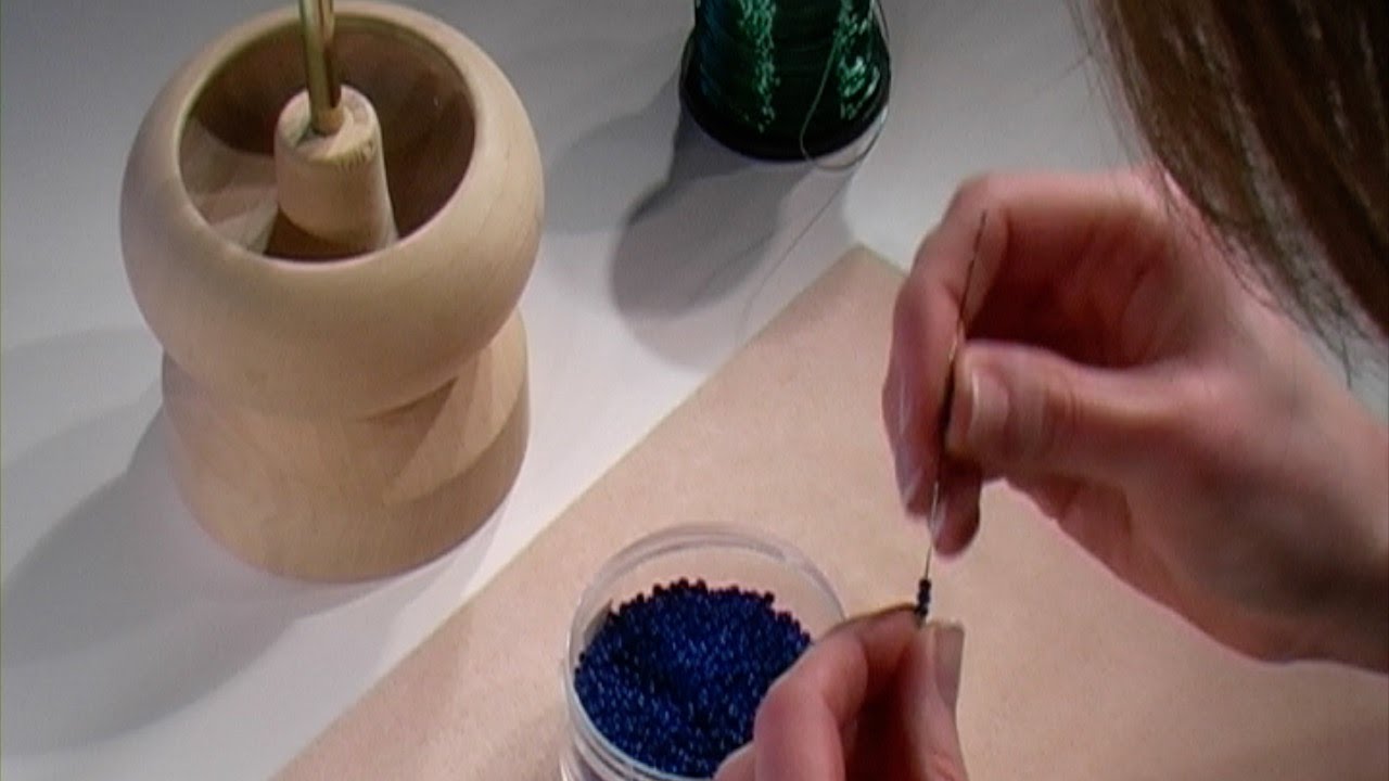 Threading beads onto wire for French beading - YouTube
