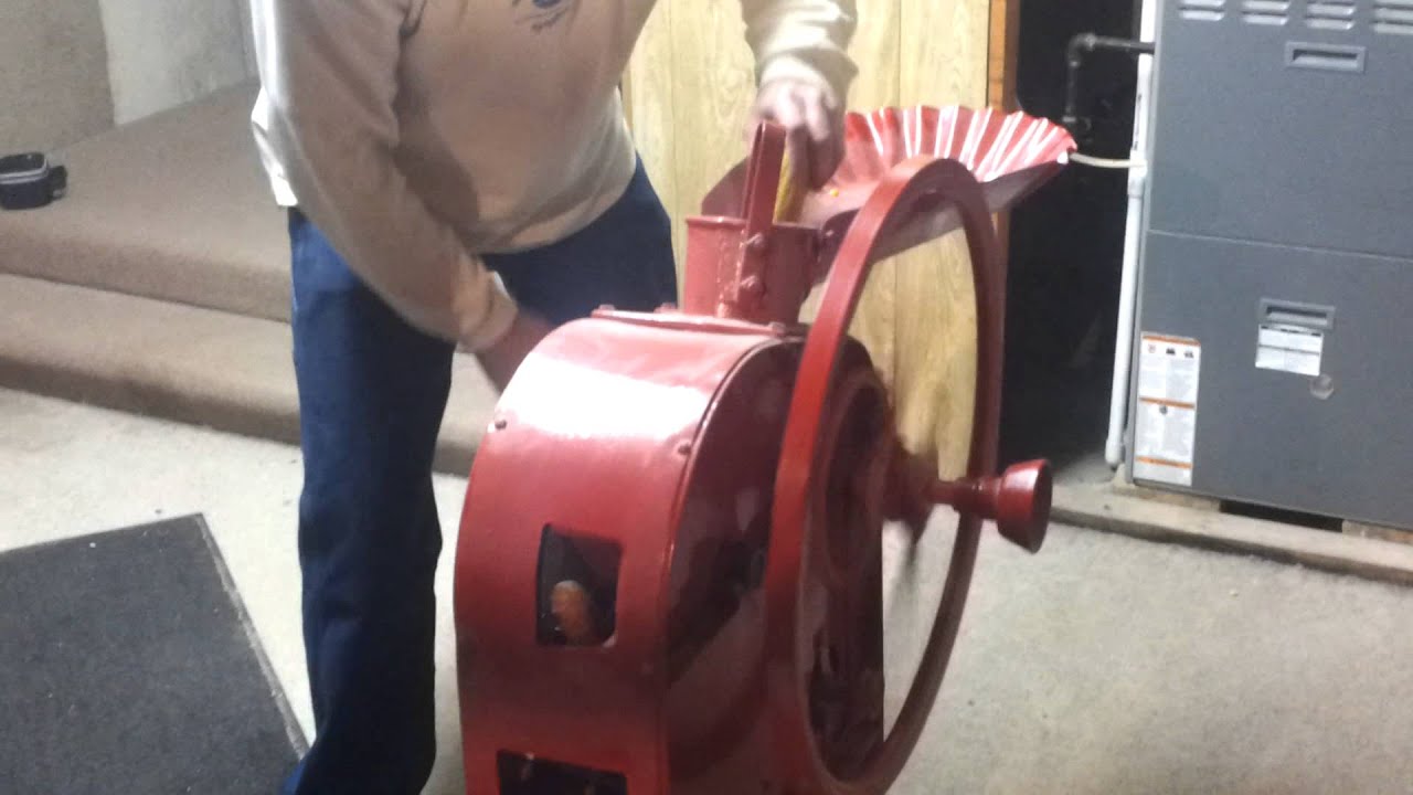 1940 hand crank corn sheller - YouTube