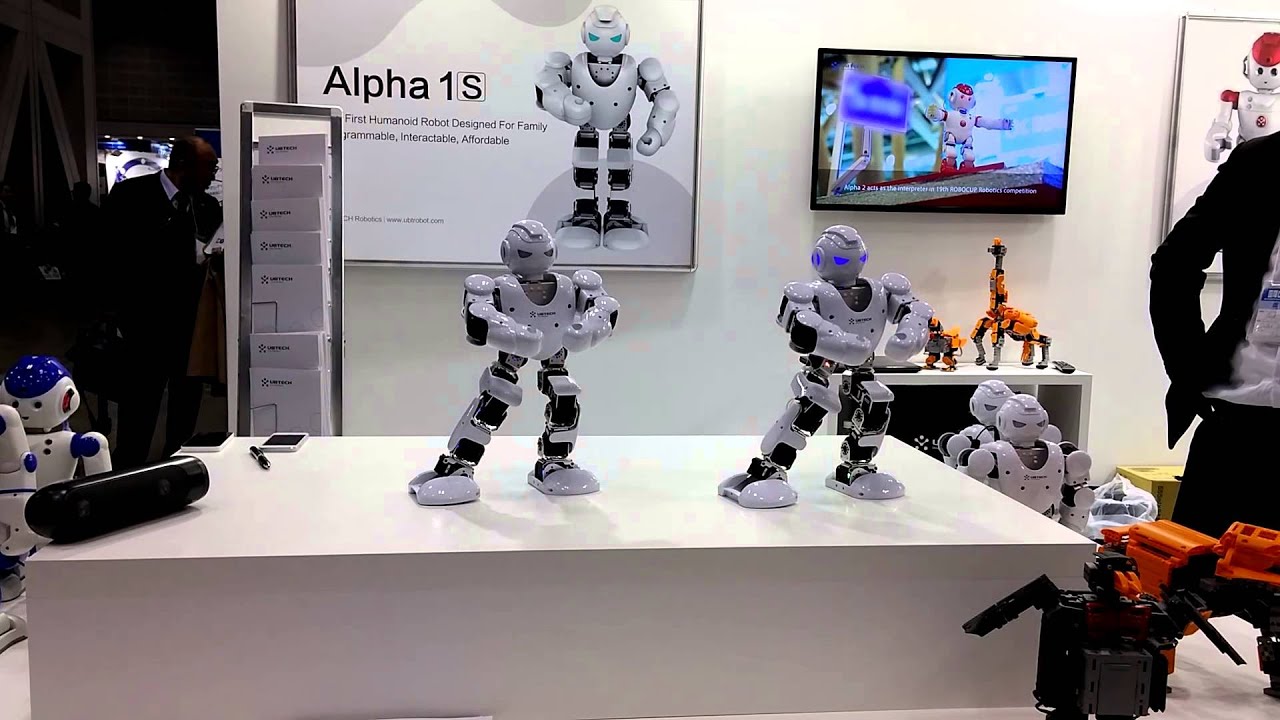 Alpha 1S robots dancing at the International Robot Exhibition 2015 ...