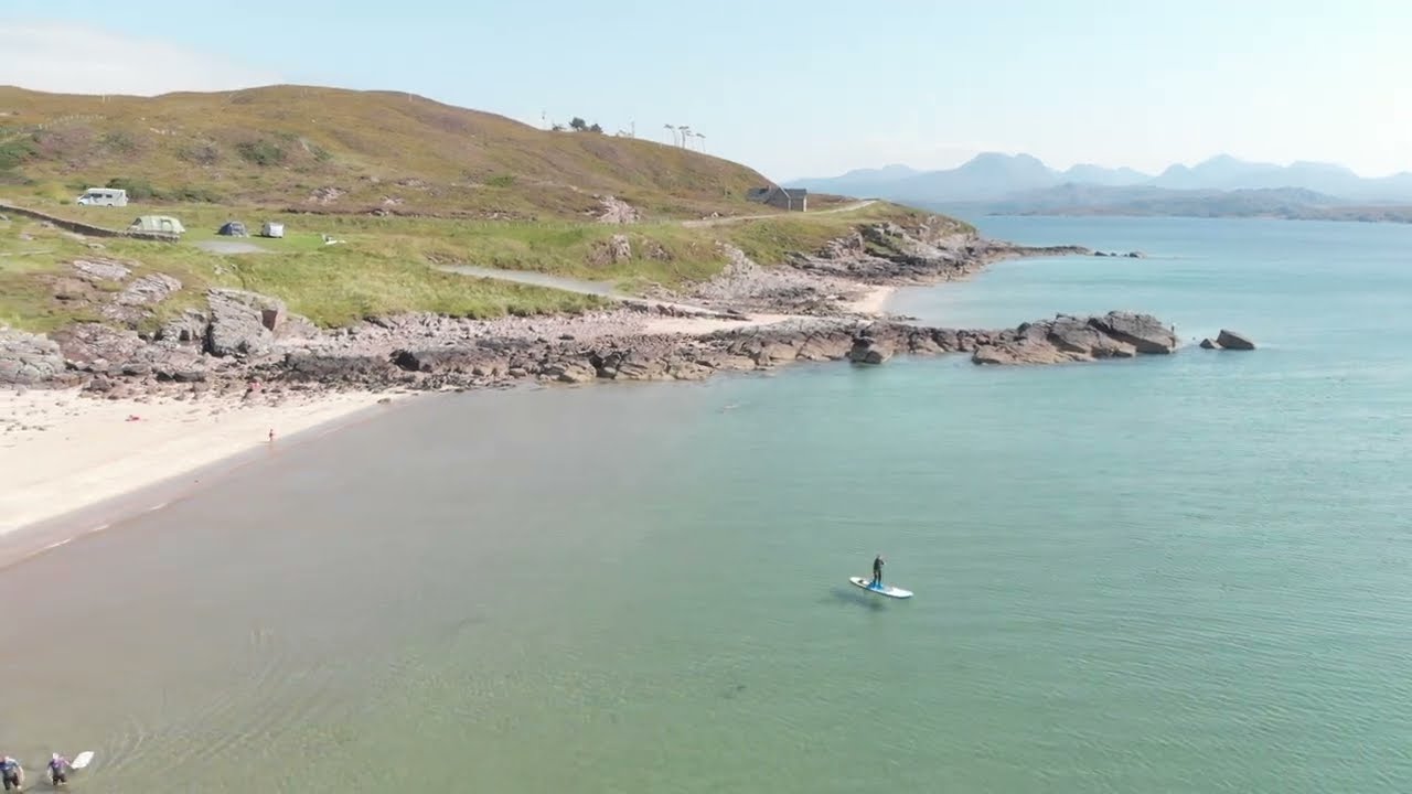Paddleboarding in Scotland from Big sands beach near Gairloch Drone ...