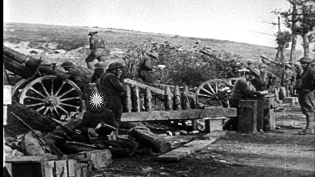 United States Army troops load shells and fire artillery on the Western ...
