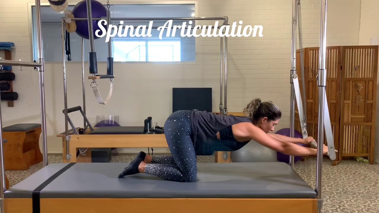 Pilates kneeling cat on the Cadillac - YouTube