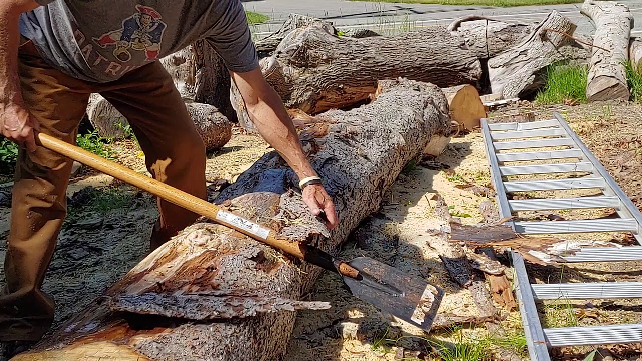 My way of stripping bark off a log. - YouTube