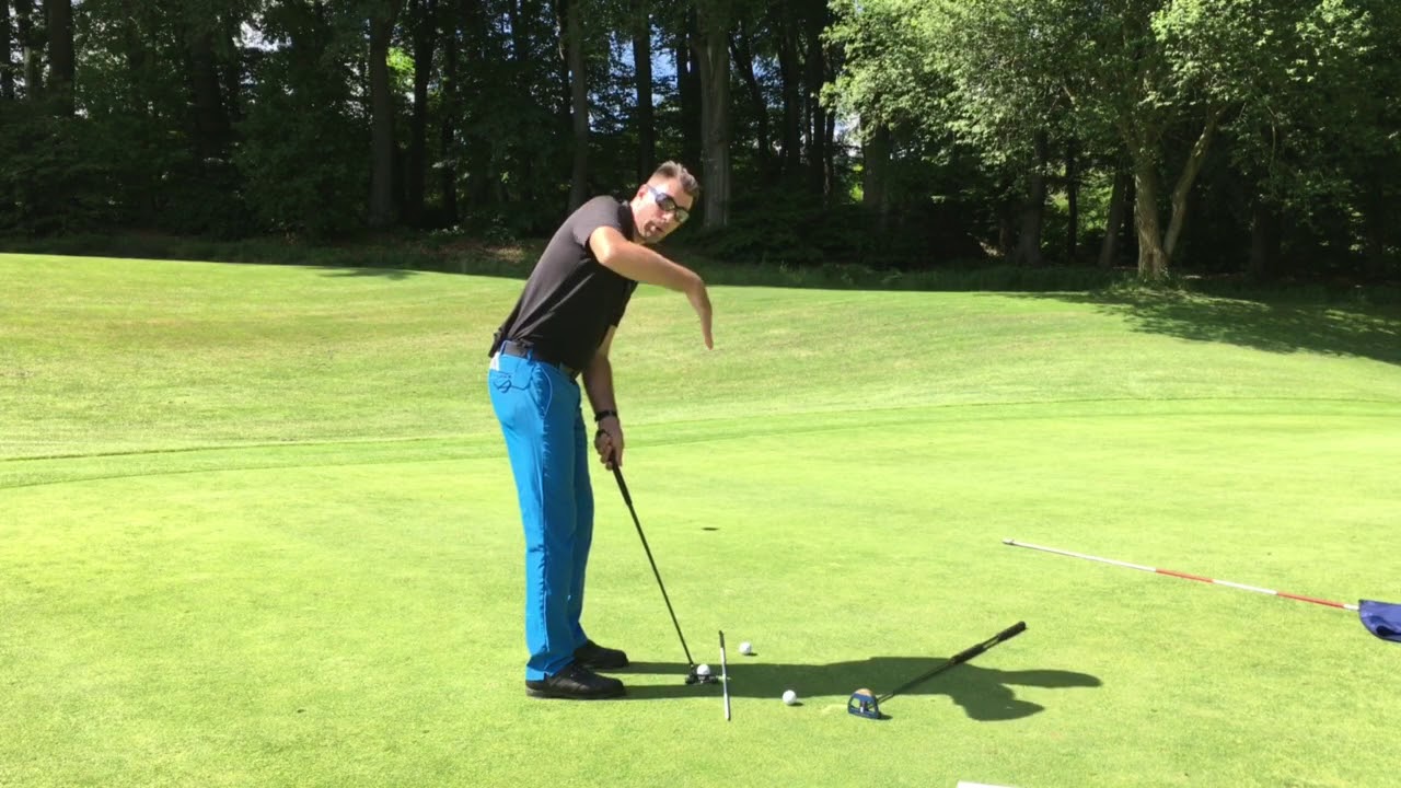 Putting stroke explained - YouTube