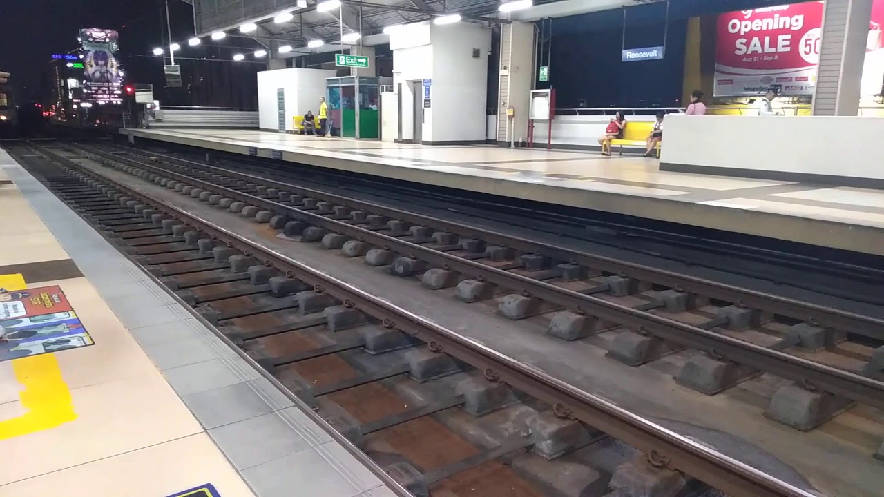 LRT-1 1G BN Acec 2 car configuration set arriving at Roosevelt station ...